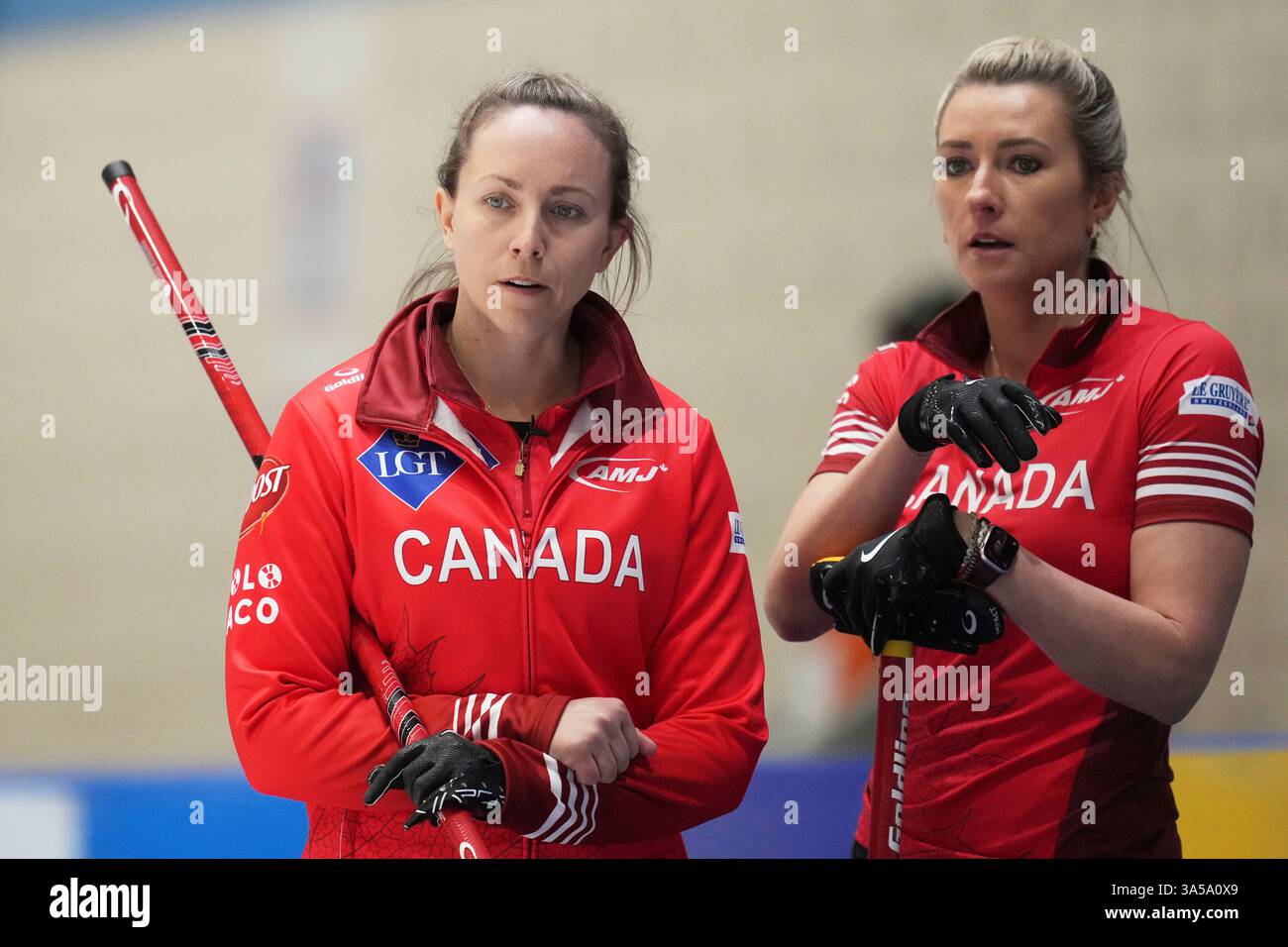 Canada's skip Rachel Homan talks with Emma Miskew during the semifinal ...