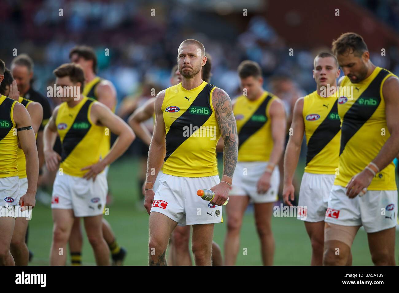 Nathan Broad of the Tigers and team mates after the loss during the AFL ...
