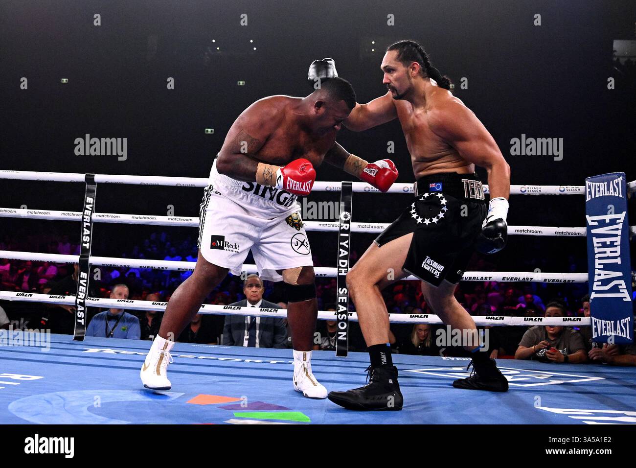 Teremoana Teremoana of Australia (right) and James Singh of Fiji during ...