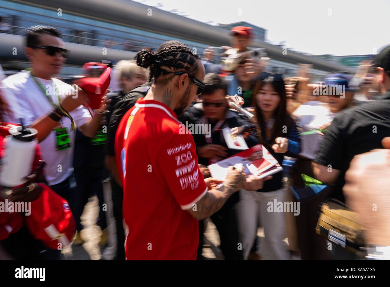 LEWIS HAMILTON (GBR) of Scuderia Ferrari #44 with fans after his win in ...