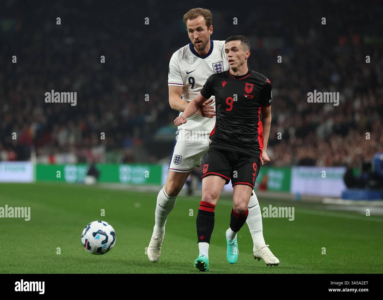 London, England, 21st March 2025. Harry Kane of England and Jasir Asani ...