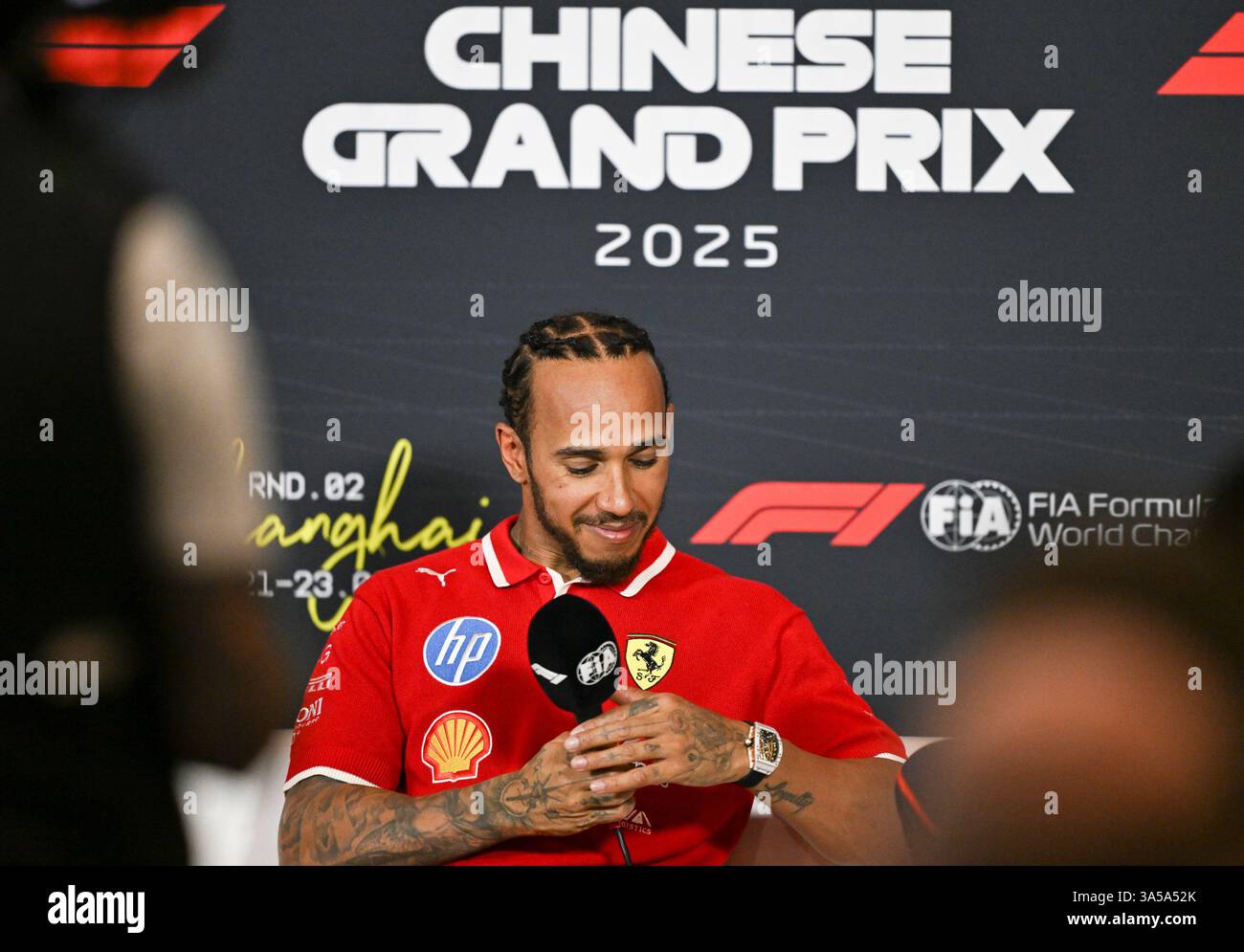 Shanghai. 22nd Mar, 2025. Ferrari's driver Lewis Hamilton of Britain ...