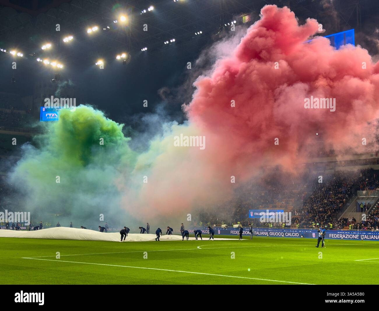 Mailand, Italy. 20th Mar, 2025. Pyrotech with the Nations colors of ...