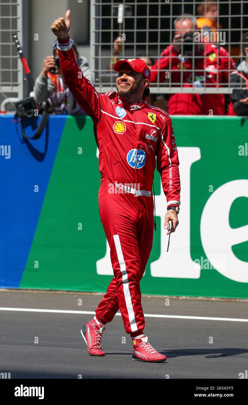 LEWIS HAMILTON (GBR) of Scuderia Ferrari #44 waving at the crowd during ...