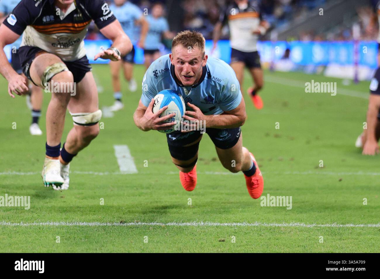 SYDNEY, AUSTRALIA - MARCH 22: Joey Walton of the Waratahs scores a try ...