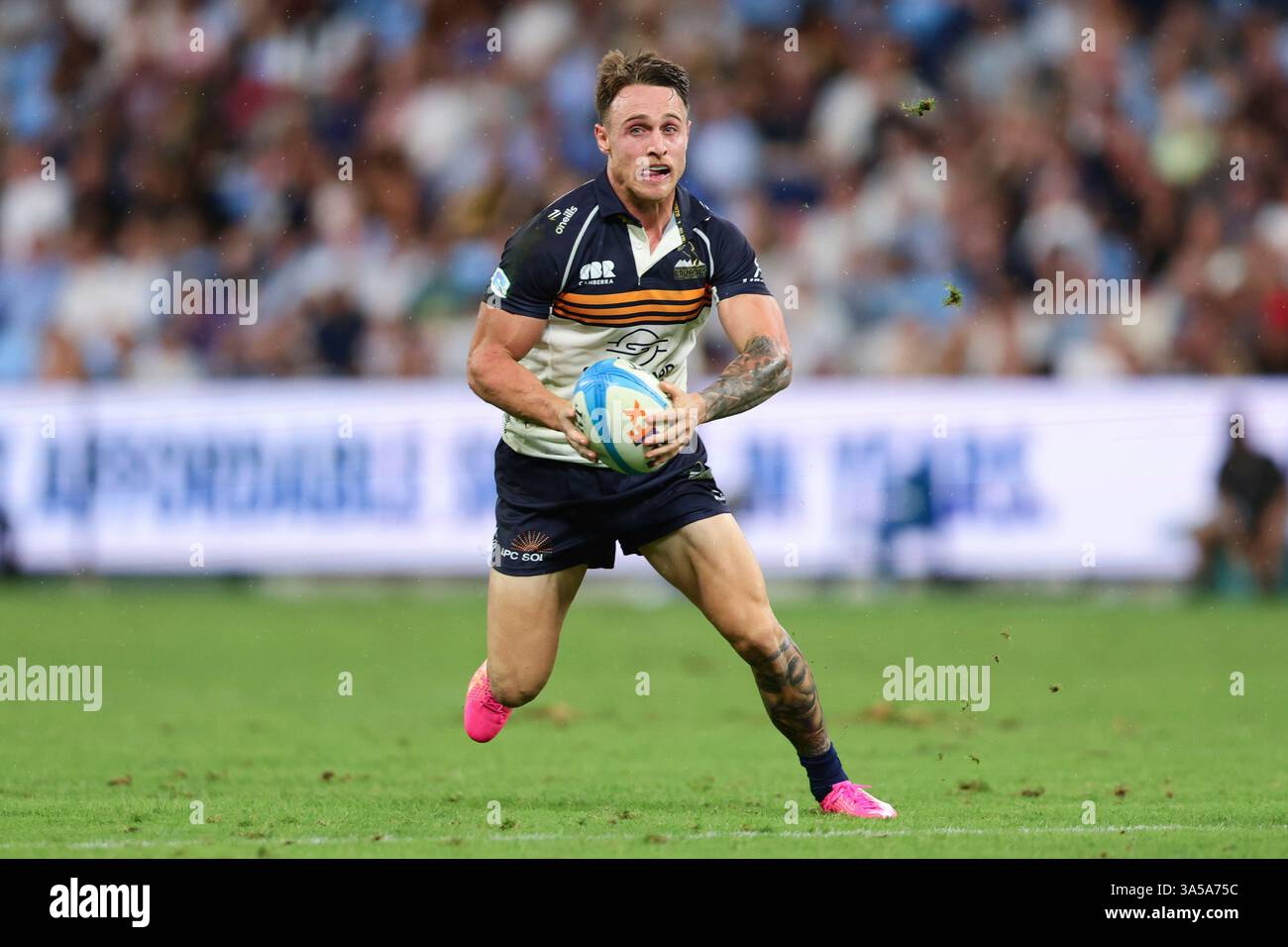 SYDNEY, AUSTRALIA - MARCH 22: Corey Toole of ACT Brumbies runs the ball ...
