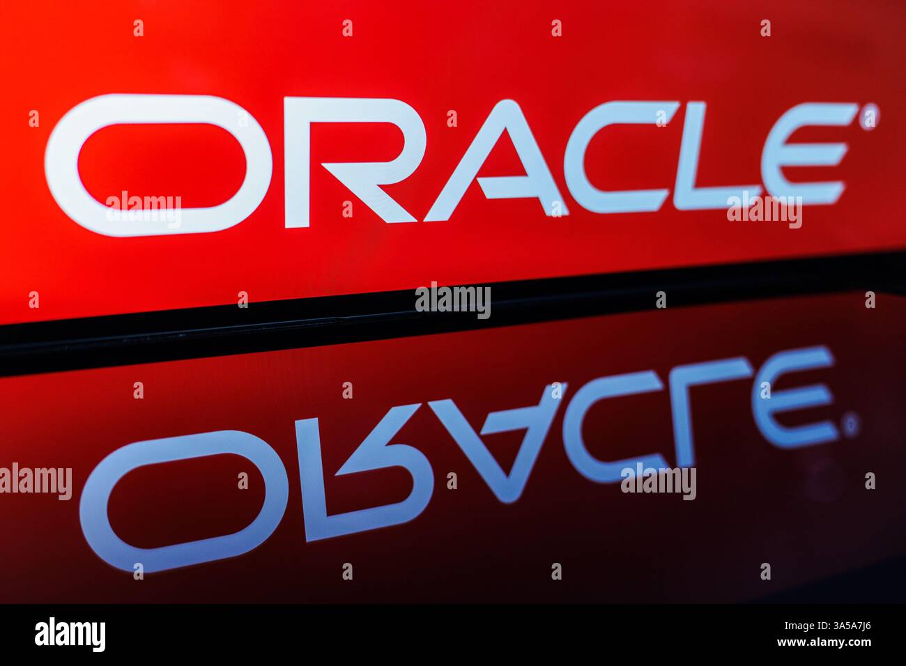 In this photo illustration, a logo of Oracle is seen displayed on ...