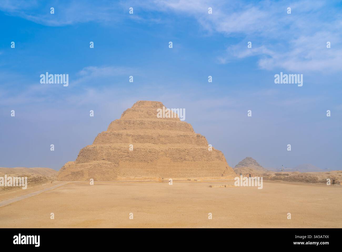 The Step Pyramid of Zoser rises from the desert sands, a monumental ...