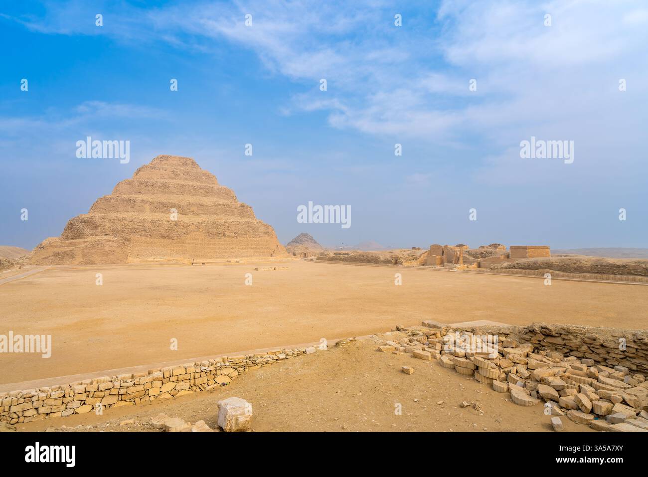 The Step Pyramid of Zoser rises from the desert sands, a monumental ...