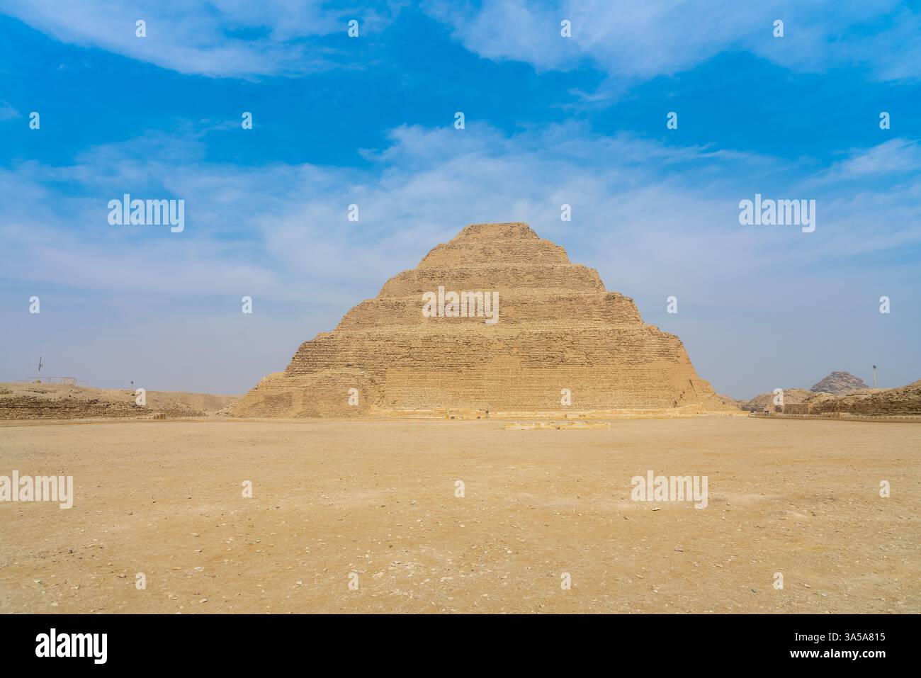 The Step Pyramid of Zoser rises from the desert sands, a monumental ...