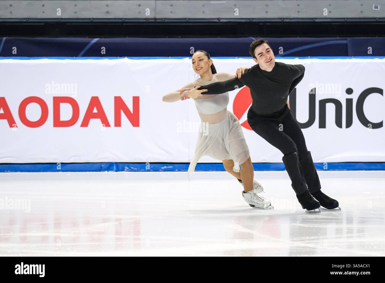 Carlotta Argentieri (L) and Francesco Riva (R) of Italy seen in action ...
