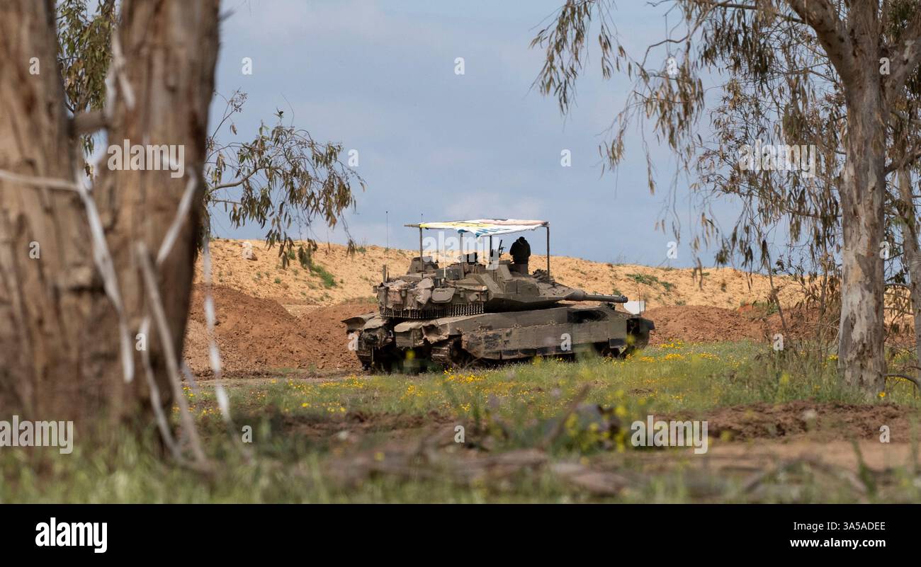 Southern Israel, Israel. 22nd Mar, 2025. An Israeli IDF tank is seen ...