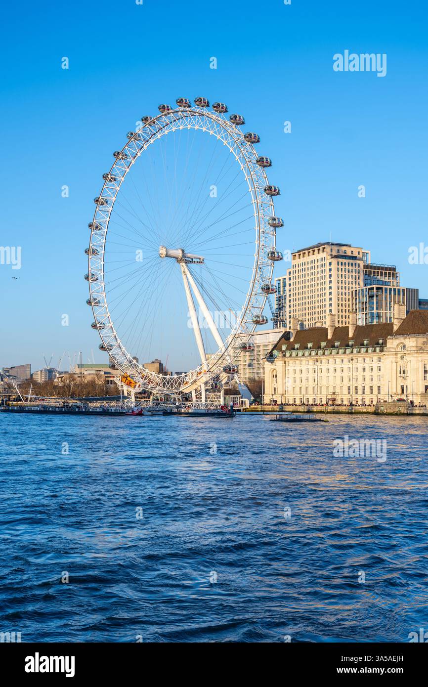 The London Eye stands tall against a clear blue sky, offering stunning ...