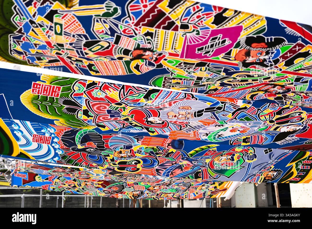 About 9-meter-long vividly painted samurai flags dry in the sun in ...