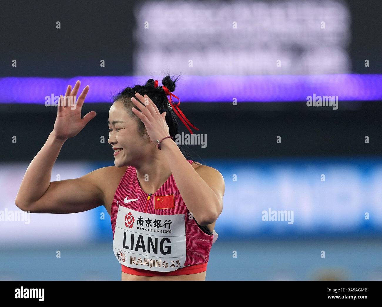 Nanjing, China's Jiangsu Province. 22nd Mar, 2025. Liang Xiaojing of China reacts after the ...