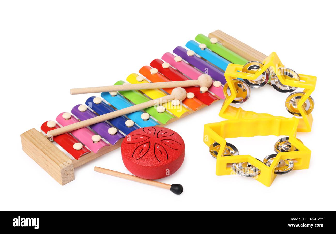 Colorful toy musical instruments isolated on white Stock Photo - Alamy