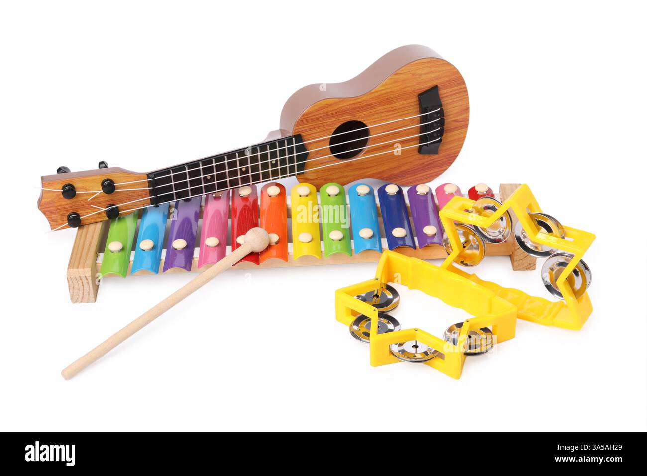 Colorful toy musical instruments isolated on white Stock Photo - Alamy