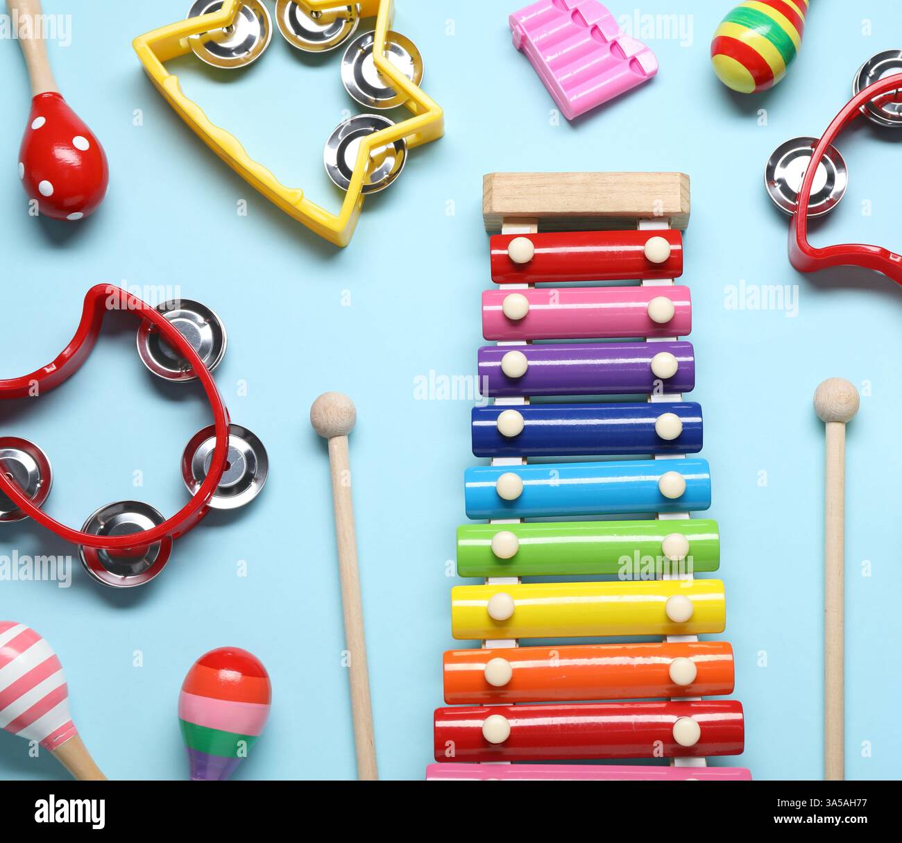 Flat lay composition with different toy musical instruments on light ...