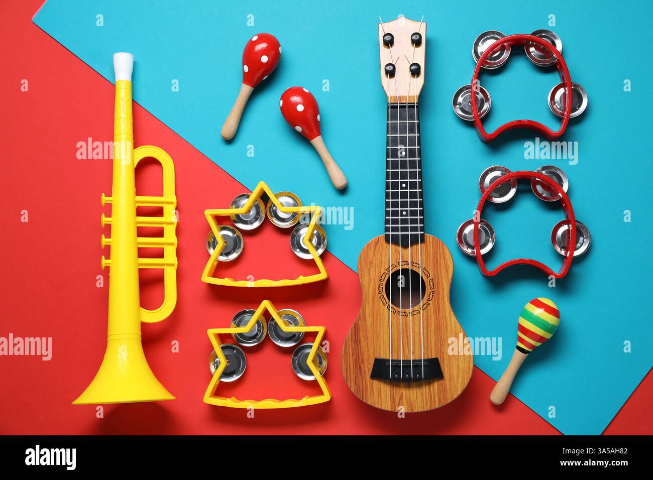 Flat lay composition with different toy musical instruments on color ...