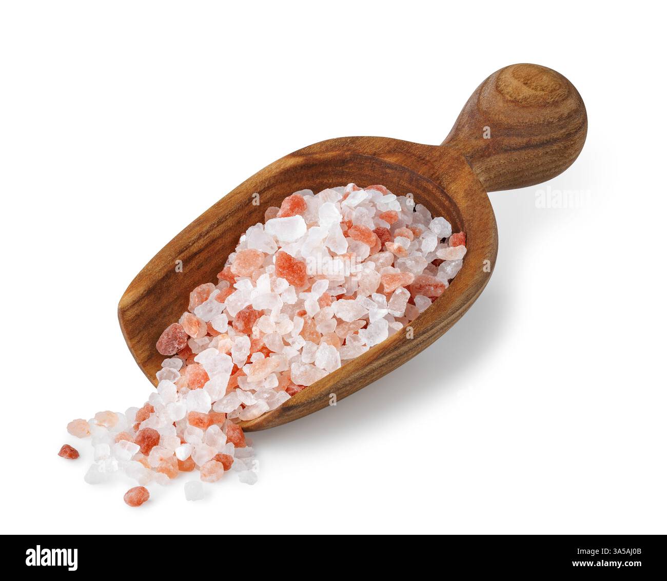 Himalayan salt spill out of wooden scoop isolated on white background ...