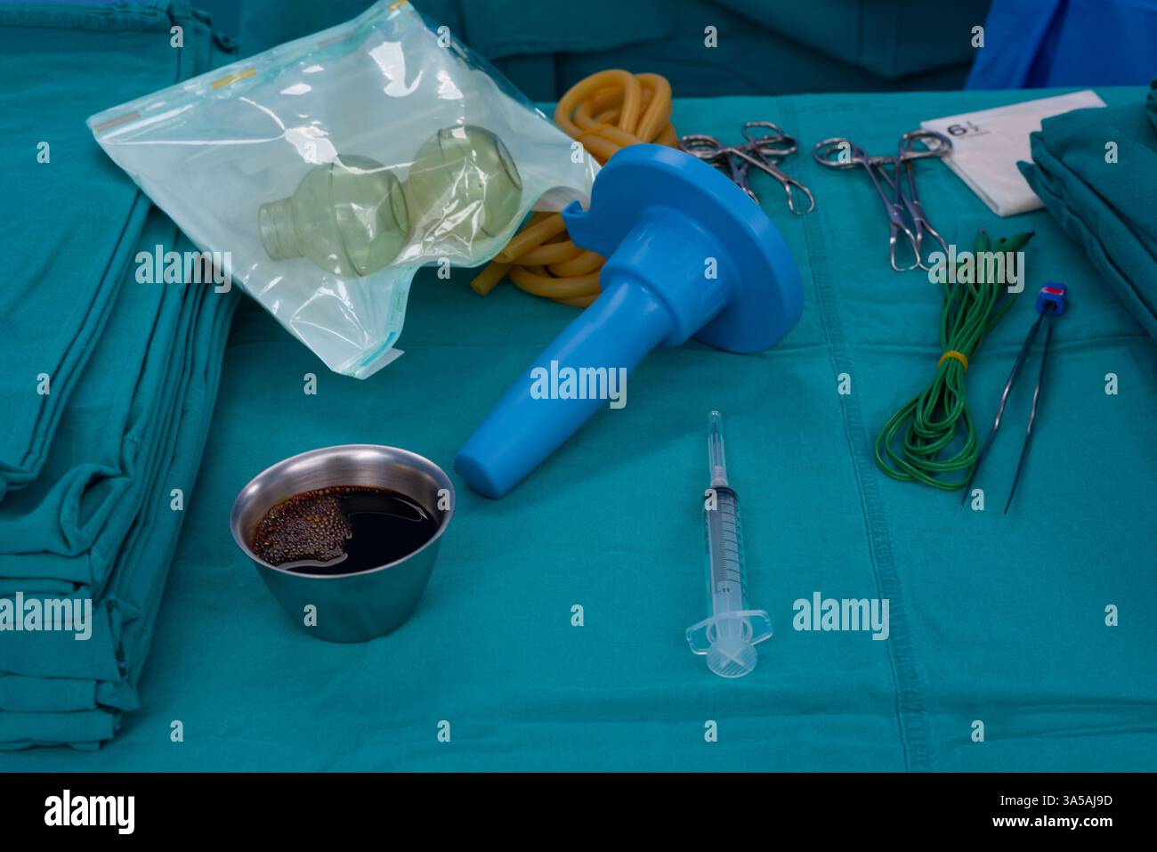 A neatly arranged collection of surgical instruments and medical ...