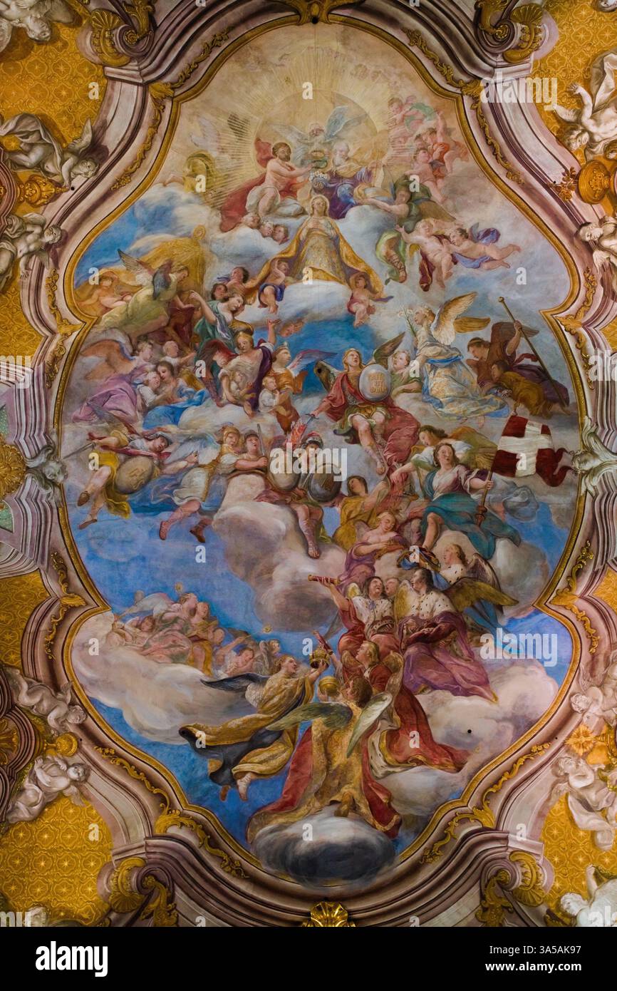 A group of angels crowning the Virgin Mary depicted in paint on the ...