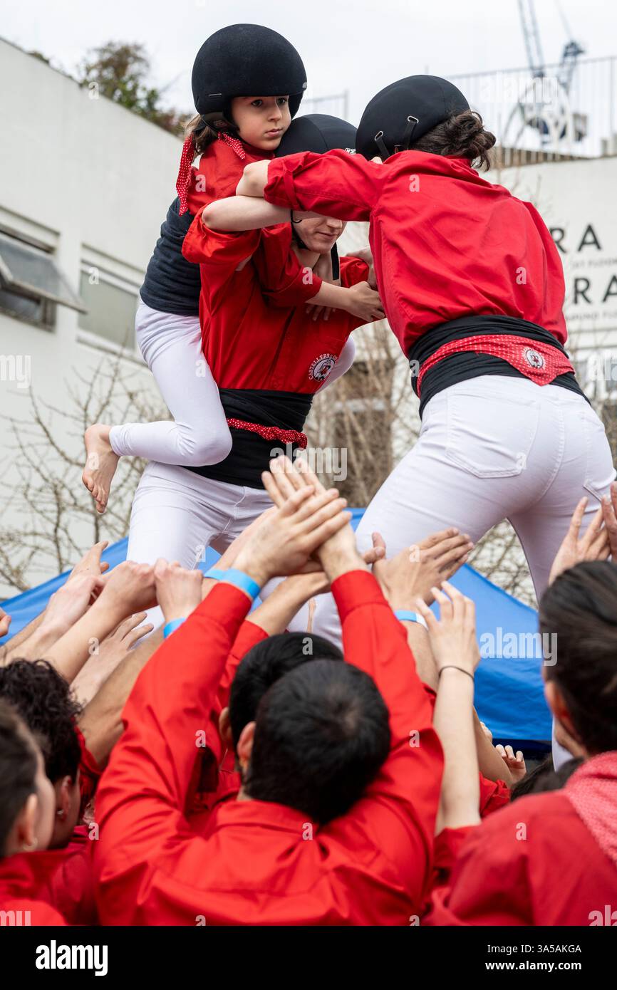 London, UK. 22 March 2025. Members of Castellers of London build ...