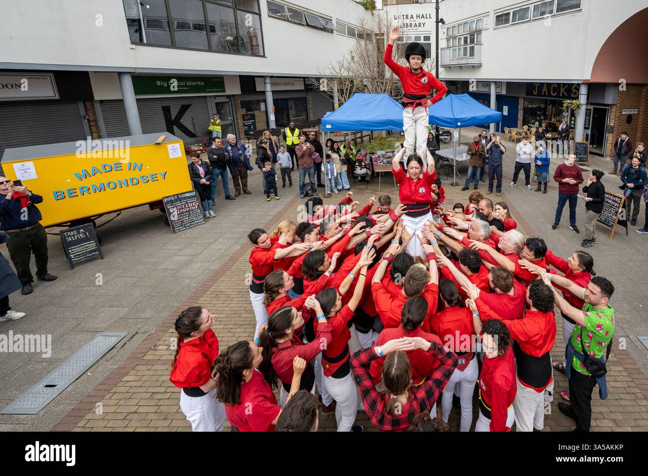 London, UK. 22 March 2025. Members of Castellers of London build ...