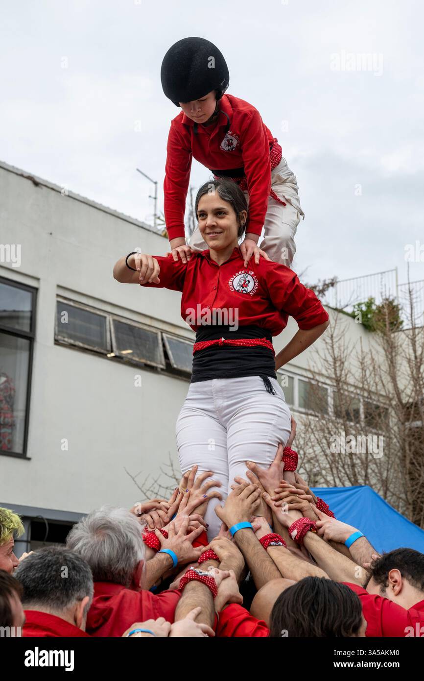 London, UK. 22 March 2025. Members of Castellers of London build ...