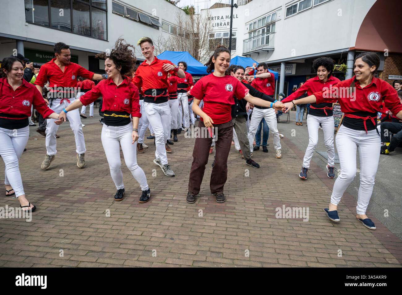 London, UK. 22 March 2025. Members of Castellers of London celebrate ...