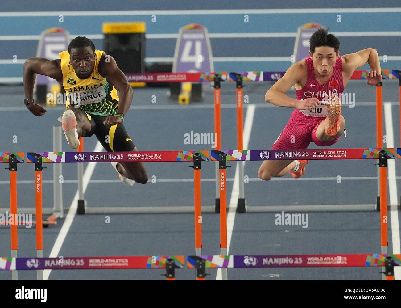 Nanjing, China's Jiangsu Province. 22nd Mar, 2025. Liu Junxi (R) of ...