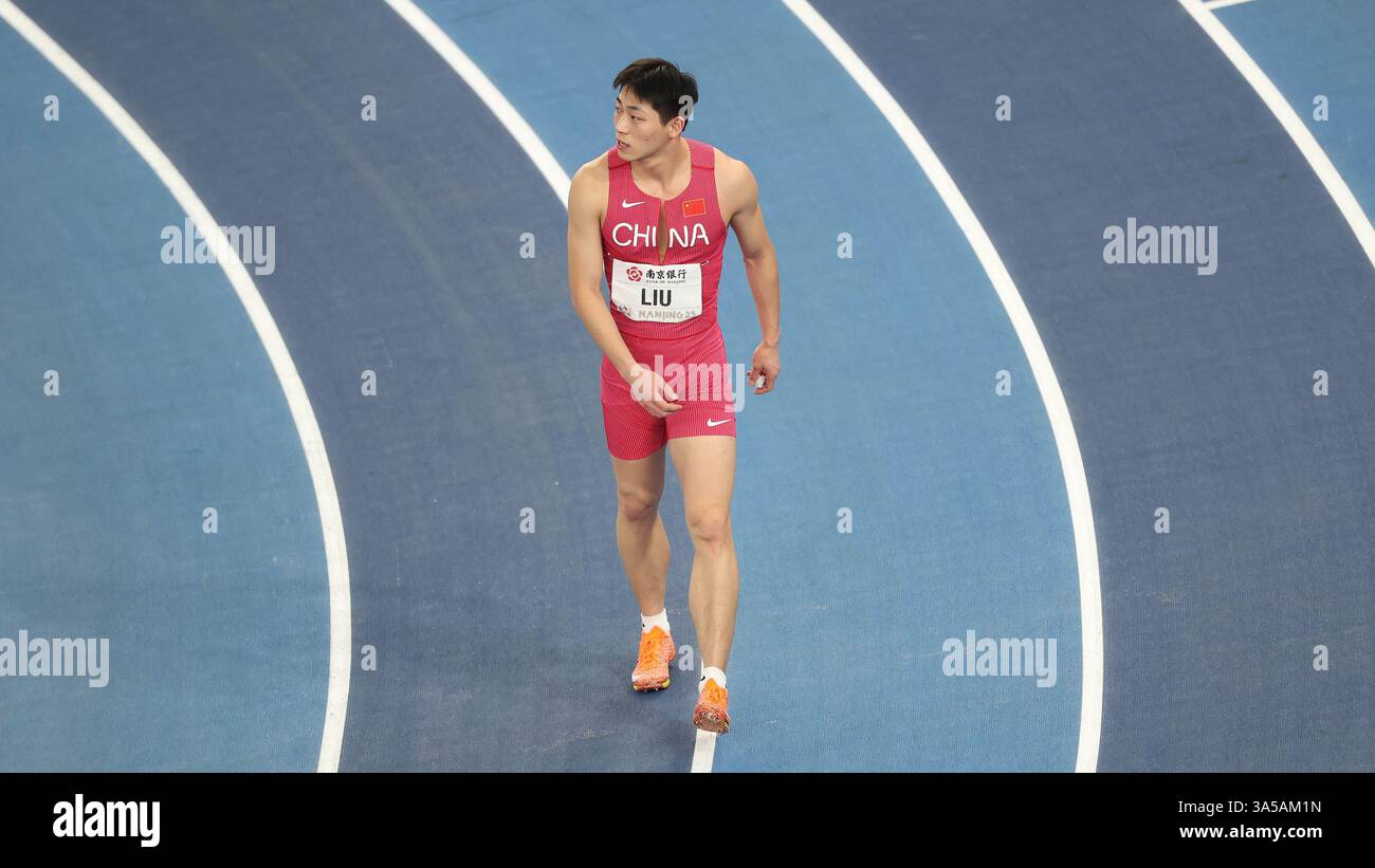 Nanjing, China's Jiangsu Province. 22nd Mar, 2025. Third placed Liu Junxi of China reacts after ...