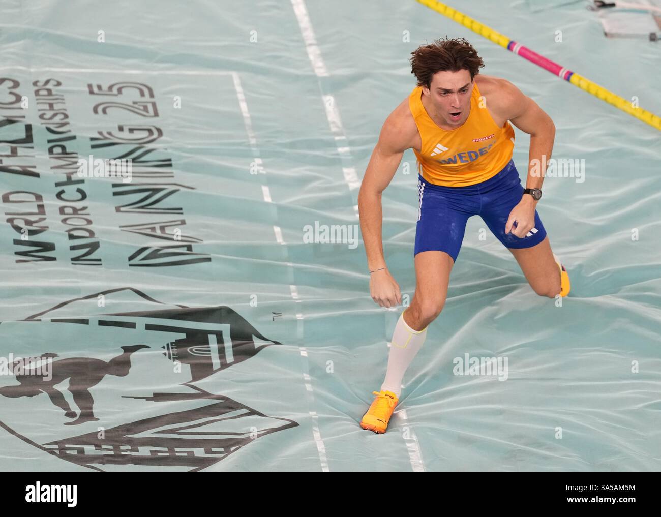 Nanjing, China's Jiangsu Province. 22nd Mar, 2025. Armand Duplantis of Sweden reacts after ...