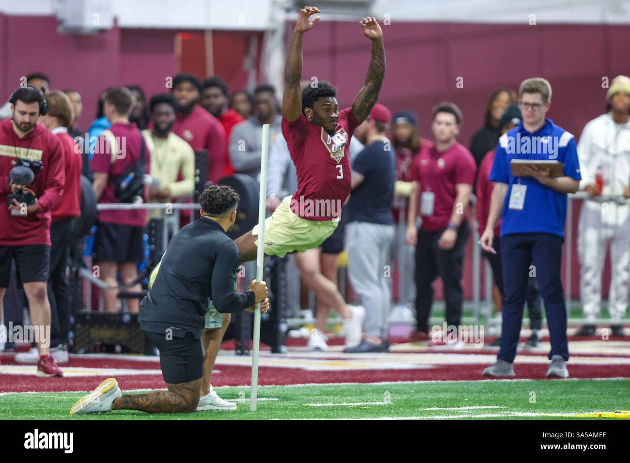 Florida State defensive back Kevin Knowles II broad jumps at the school ...