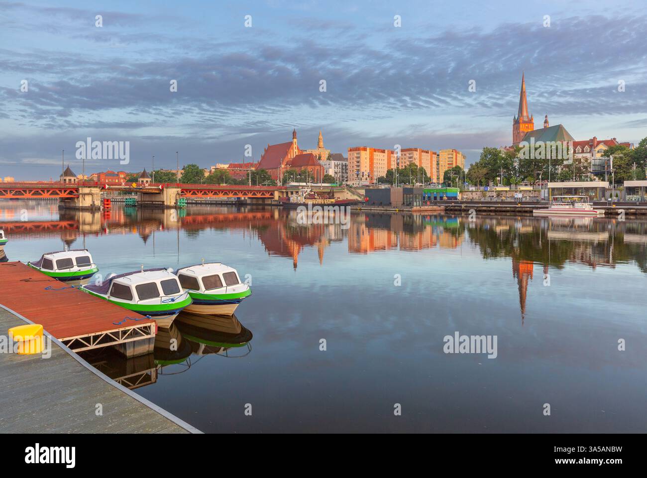 Oder River waterfront in Szczecin Poland with illuminated buildings and ...