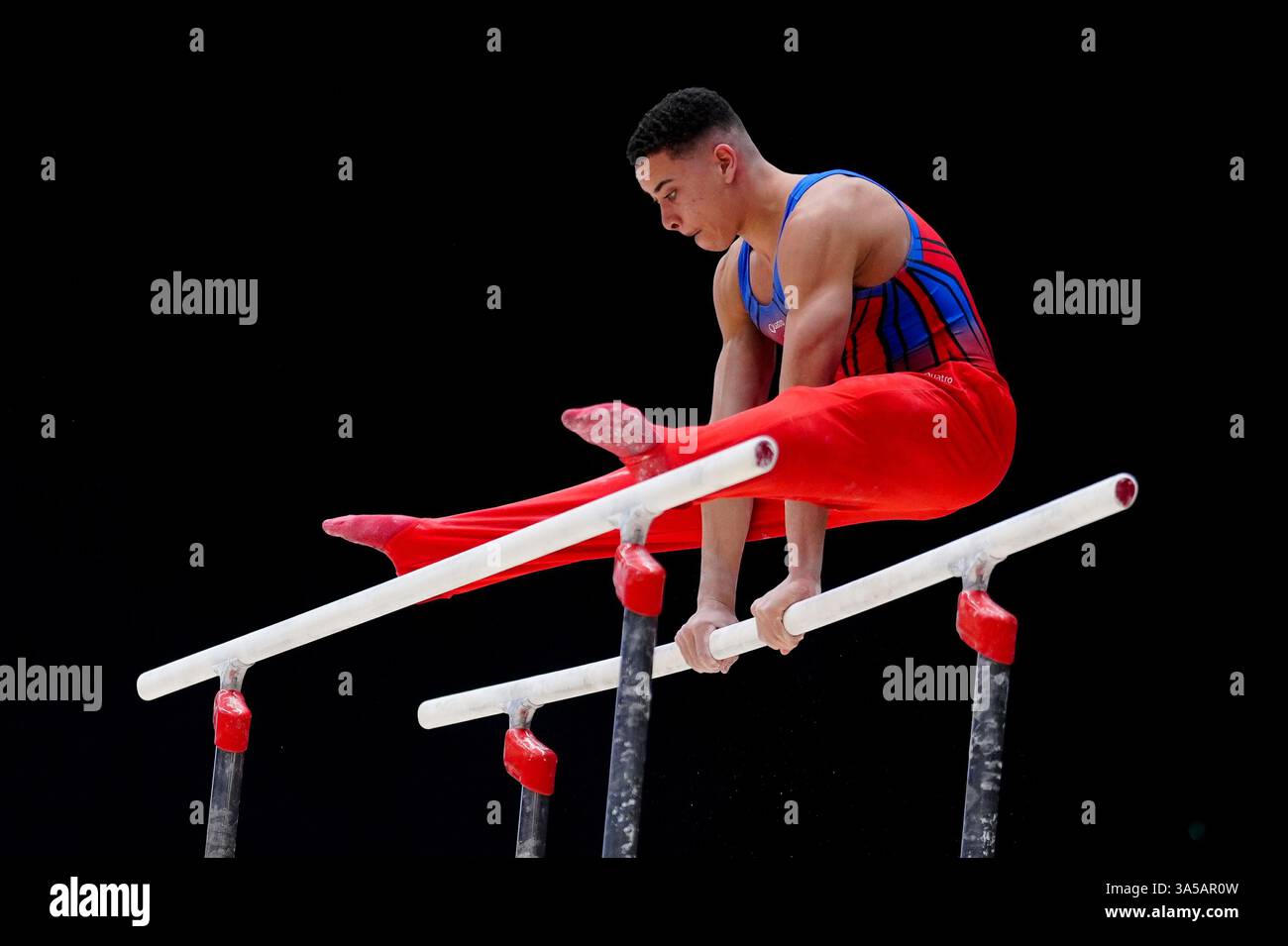 Sol Scott performs on the parallel bars on day three of the 2025 ...