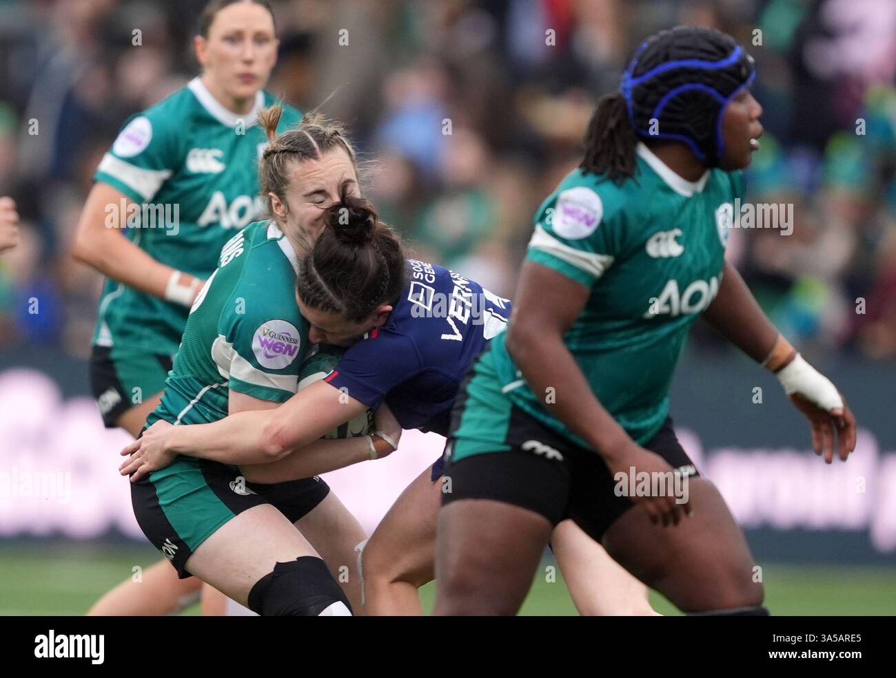 Ireland's Eve Higgins is tackled by France's Gabrielle Vernier ...
