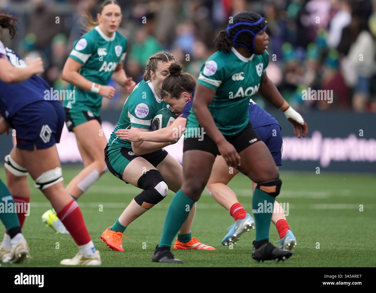 Ireland's Eve Higgins is tackled by France's Gabrielle Vernier ...