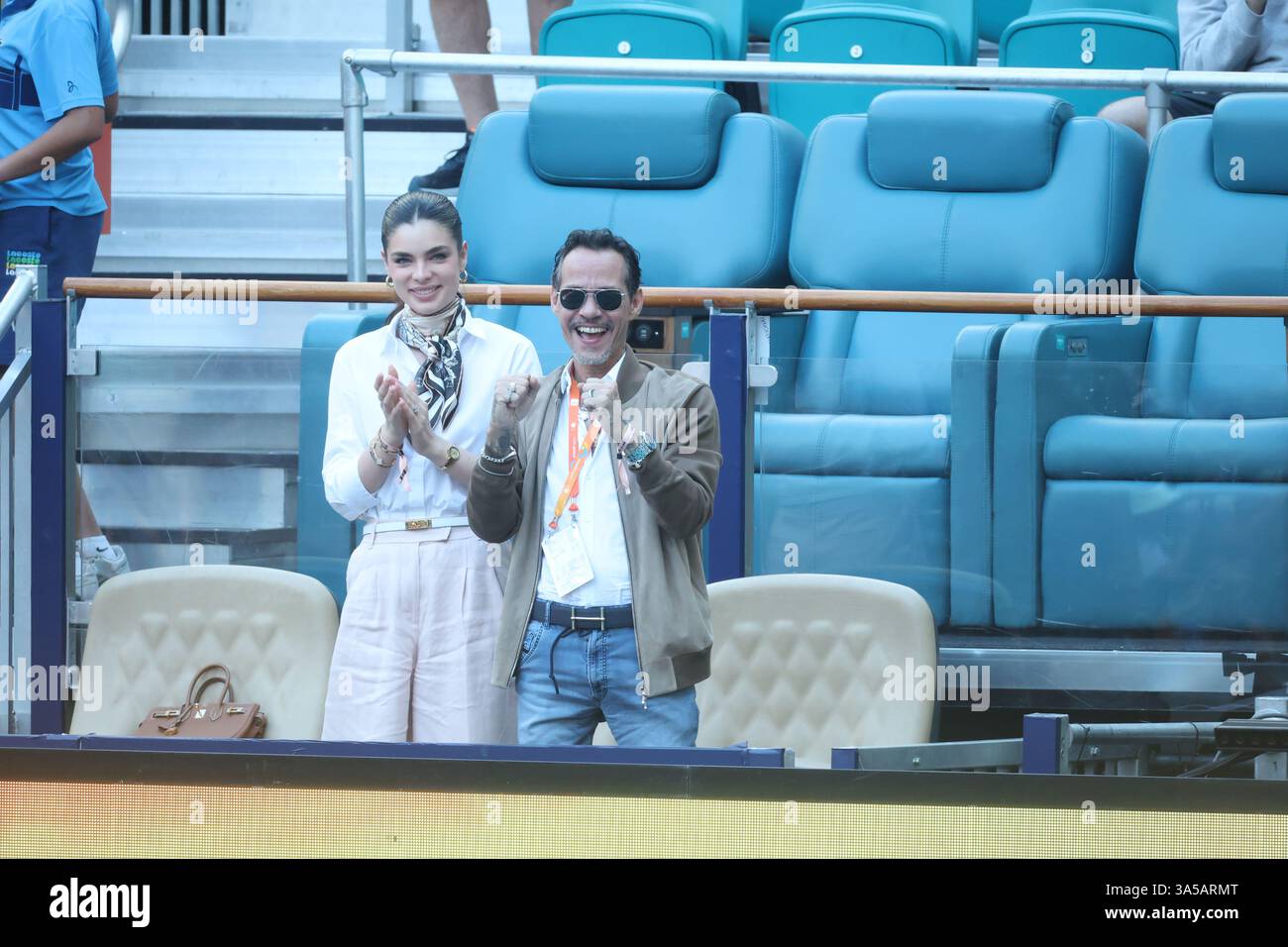 Miami Gardens, Florida, USA. 21st Mar, 2025. Marc Anthony and his wife Nadia Ferreira attend the ...