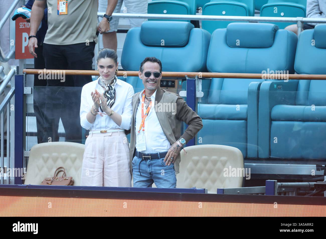 Miami Gardens, Florida, USA. 21st Mar, 2025. Marc Anthony and his wife Nadia Ferreira attend the ...