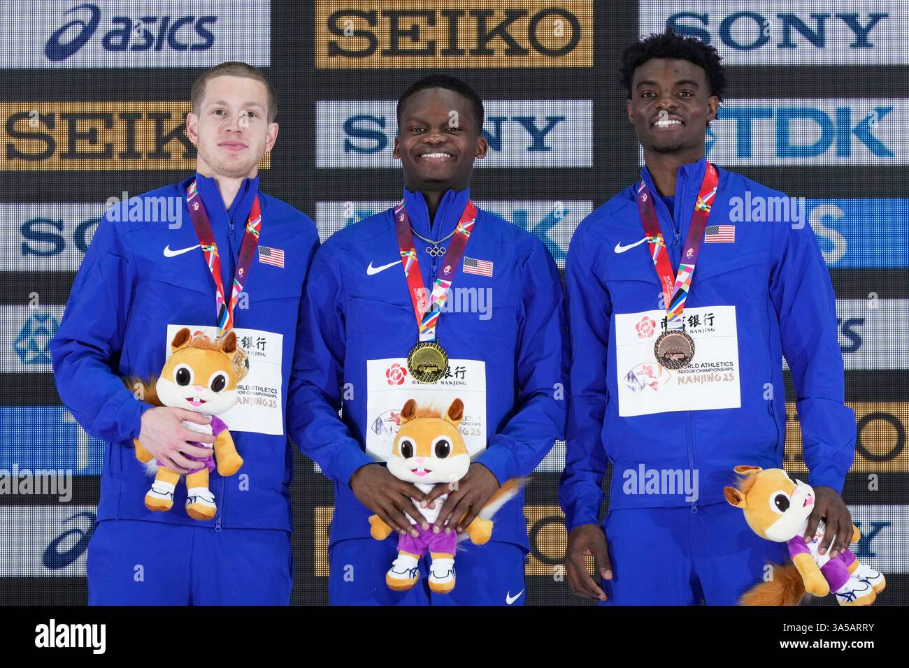 Silver medalist Brian Faust, gold medalist Christopher Bailey and ...