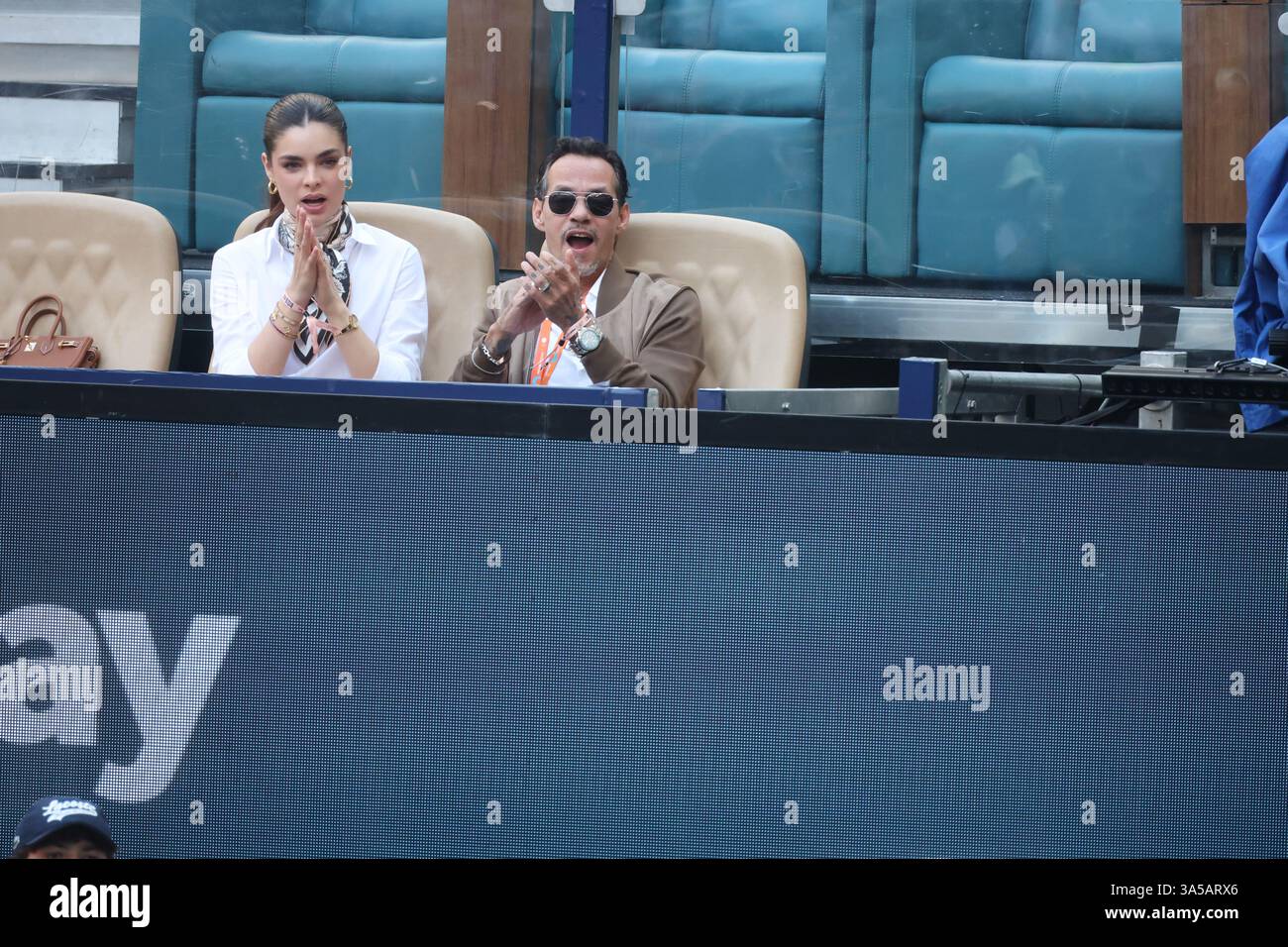 Miami Gardens, Florida, USA. 21st Mar, 2025. Marc Anthony and his wife Nadia Ferreira attend the ...