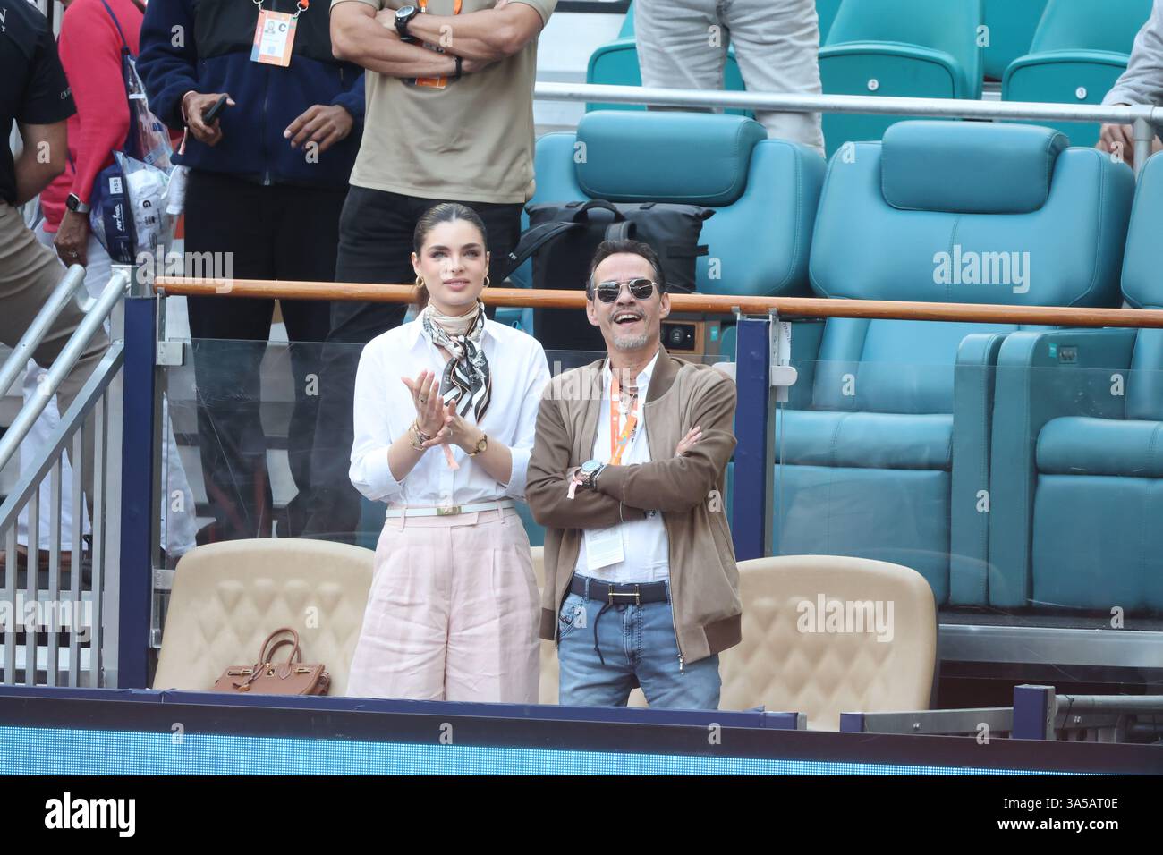 Miami Gardens, Florida, USA. 21st Mar, 2025. Marc Anthony and his wife Nadia Ferreira attend the ...