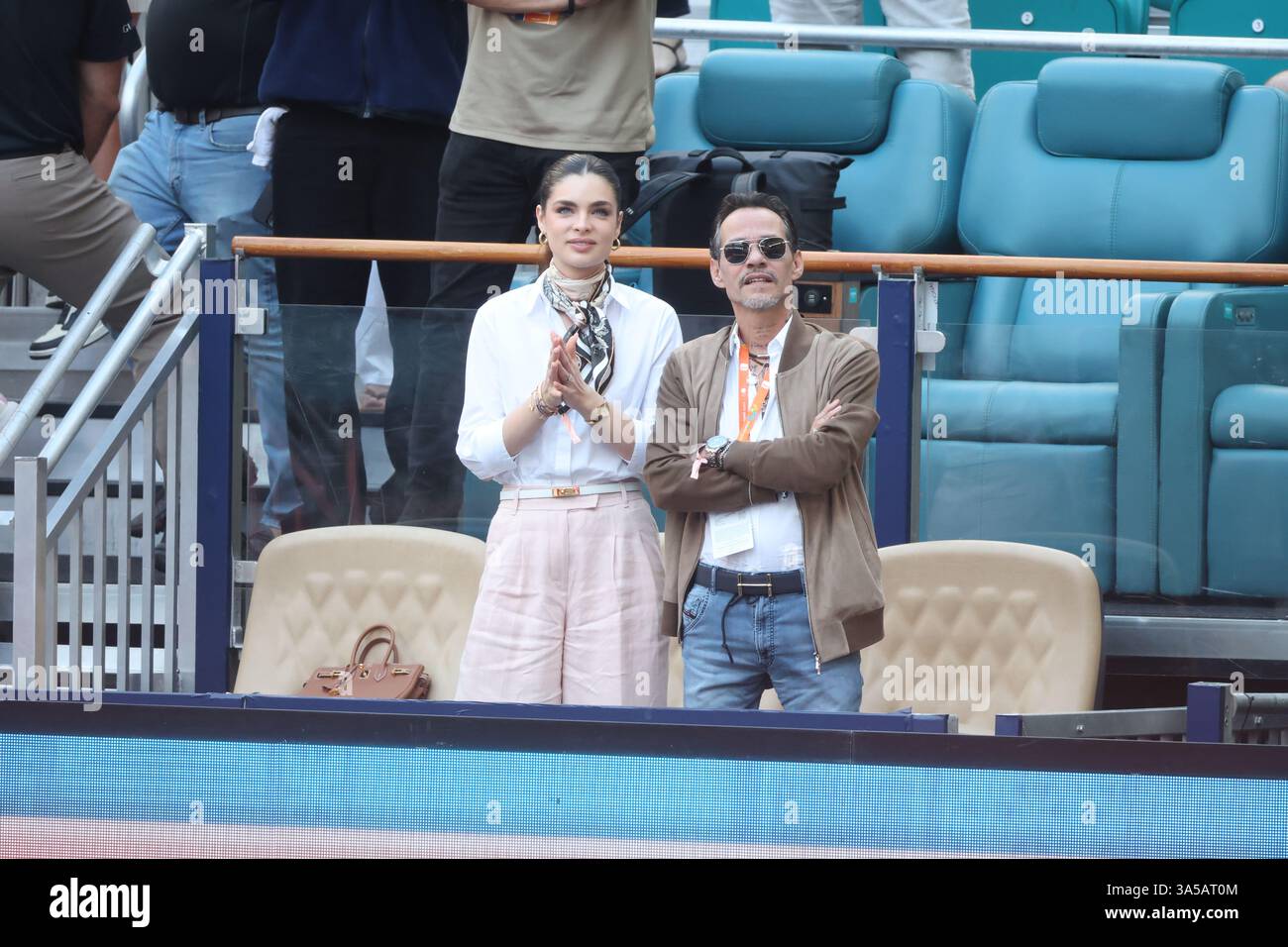 Miami Gardens, Florida, USA. 21st Mar, 2025. Marc Anthony and his wife Nadia Ferreira attend the ...