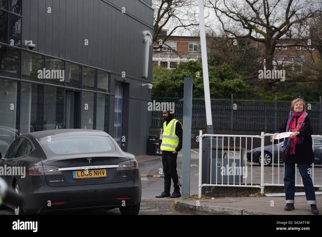 Anti Tesla demonstrators protest outside a Tesla centre showroom at ...