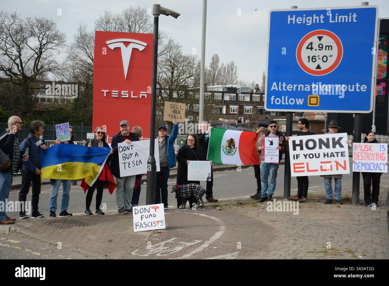 Anti Tesla demonstrators protest outside a Tesla centre showroom at ...