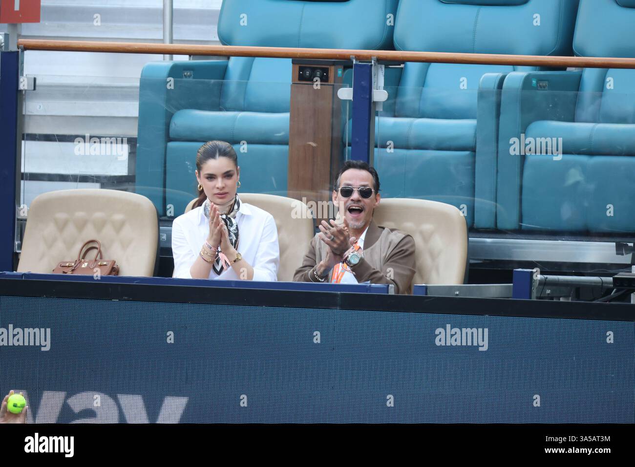 Miami Gardens, Florida, USA. 21st Mar, 2025. Marc Anthony and his wife Nadia Ferreira attend the ...