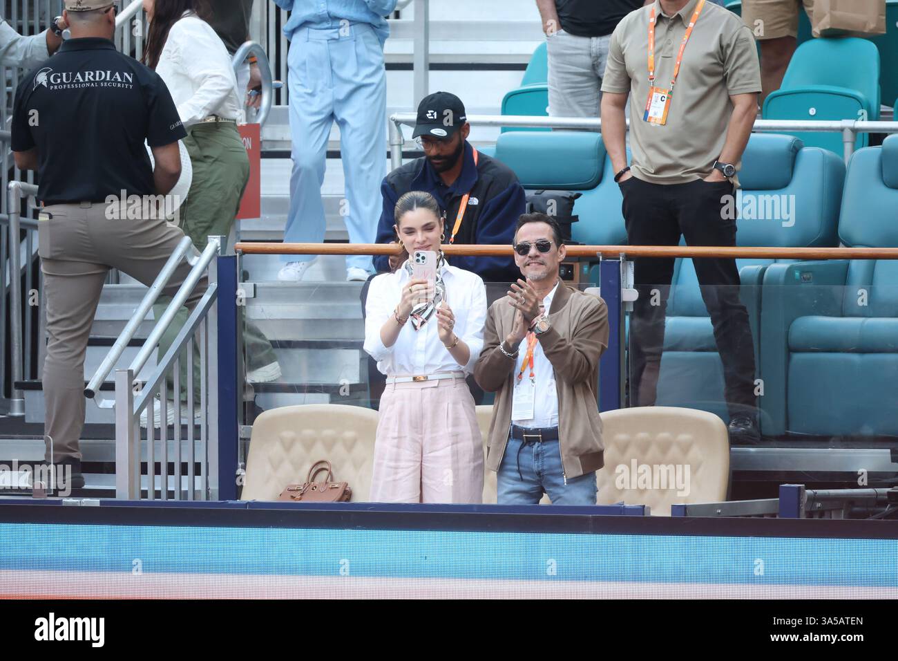 Miami Gardens, Florida, USA. 21st Mar, 2025. Marc Anthony and his wife Nadia Ferreira attend the ...