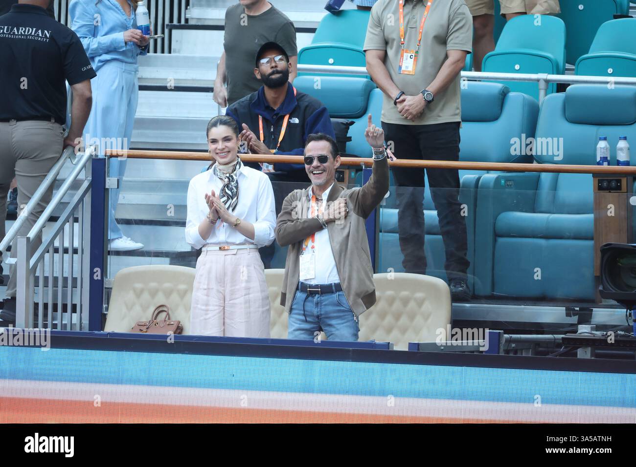 Miami Gardens, Florida, USA. 21st Mar, 2025. Marc Anthony and his wife Nadia Ferreira attend the ...
