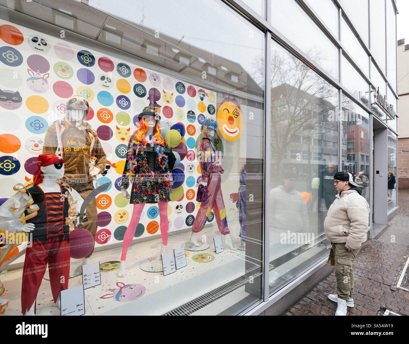 Freiburg, Germany - Feb 10, 2025: Colorful carnival costumes are ...
